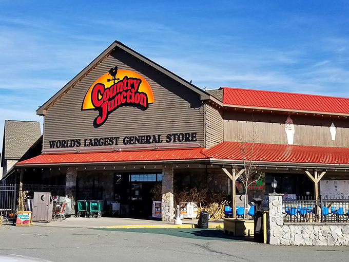 The rustic facade of Country Junction proudly declares its status as "World's Largest General Store," a claim that feels entirely believable once you step inside.