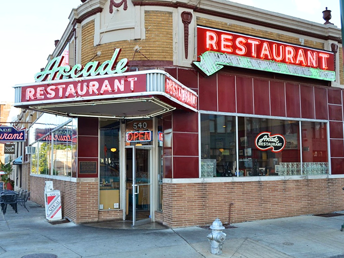 That mint green script against classic red tile isn't just a sign&mdash;it's a time machine disguised as Memphis's oldest caf&eacute;. Some neon just speaks to your soul.