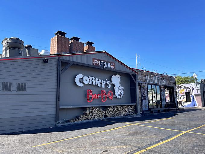 The unassuming exterior of Corky's hides barbecue greatness within, like finding a diamond in your backyard. That neon sign promises smoky delights await.