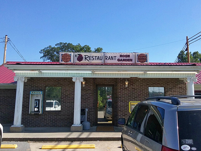 The unassuming brick exterior with its bright red roof is like finding a treasure chest disguised as a toolbox. Culinary magic happens inside!