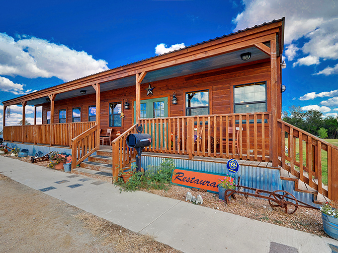 The rustic wooden exterior of Good Luck Grill beckons like an old friend, promising comfort food treasures beneath that corrugated metal roof and welcoming porch.