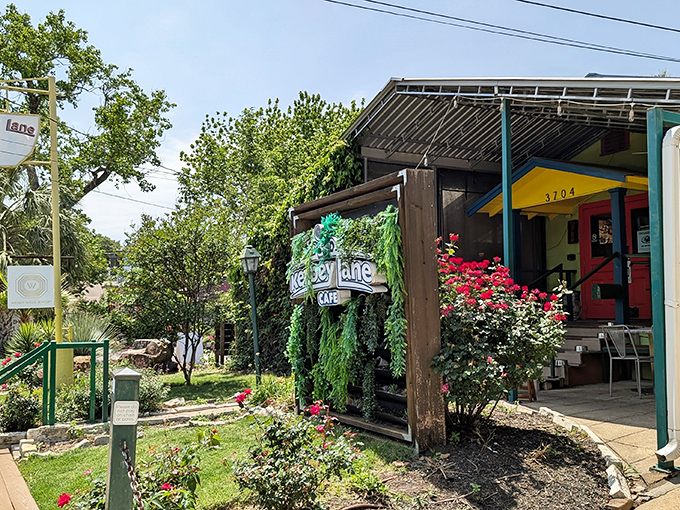 The cheerful yellow exterior with its iconic red door feels like Austin's version of a warm hug – inviting you in before you've even parked.