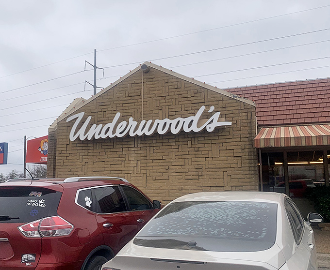 The limestone facade of Underwood's stands like a beacon of culinary promise under the vast Texas sky. Some buildings just whisper "good food happens here."