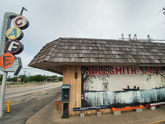 The iconic vertical "CAFE" sign beckons hungry travelers like a lighthouse for breakfast sailors. Classic Americana at its finest in Van Alstyne.