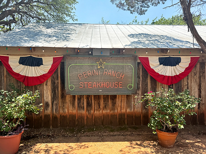 The unassuming exterior of Perini Ranch Steakhouse proves once again that in Texas, the most spectacular food often hides behind the most modest facades.