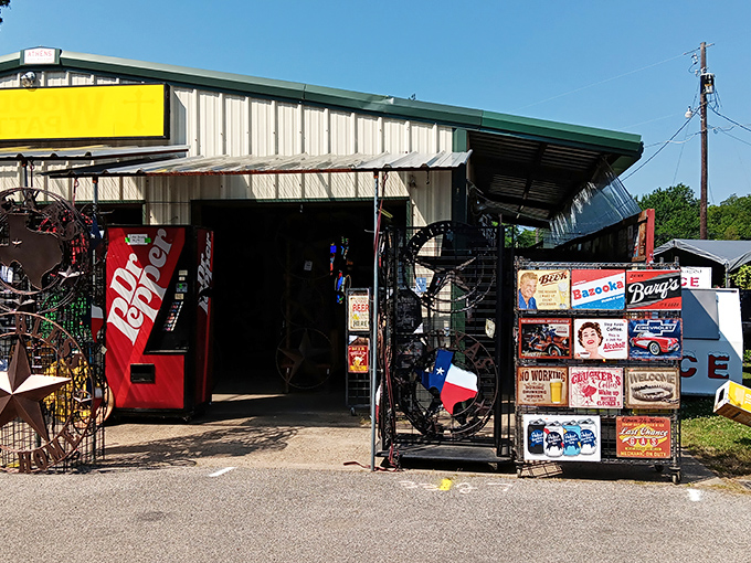 Garden treasures galore! This outdoor vendor's colorful display of planters, metal art, and decorative urns would make even the brownest thumb feel inspired.