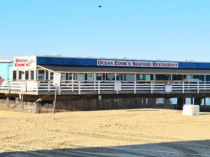 Ocean Eddie's bright blue exterior stands out against the golden sand, like a beachfront postcard come to life in Virginia Beach.