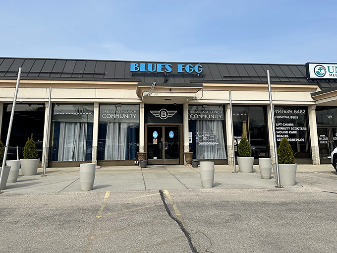 The blue sign beckons like a breakfast lighthouse, guiding hungry souls to this Milwaukee temple of morning delights. No passport required for this culinary journey.