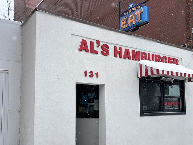 The iconic white exterior with bold red lettering and vintage "EAT" sign has been beckoning hungry Green Bay visitors since FDR was president.