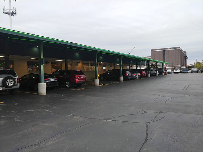 The iconic green-trimmed exterior of Kroll's West stands like a time capsule of Wisconsin dining history, complete with vintage neon sign that beckons hungry travelers.