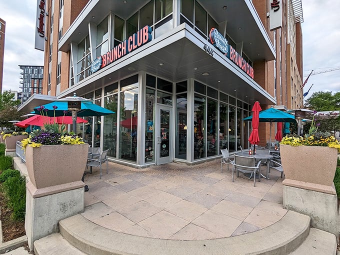 The corner spot that launched a thousand brunch pilgrimages. Bassett Street Brunch Club's modern exterior promises culinary salvation for the morning-starved masses.