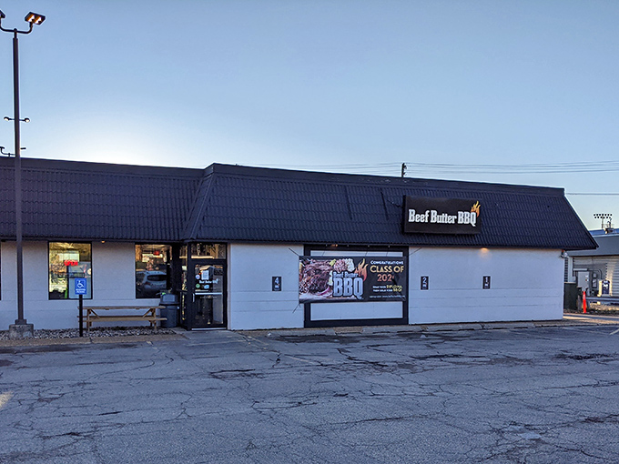 Don't let the humble exterior fool you – behind this unassuming façade lies a barbecue paradise that's been known to convert vegetarians with a single whiff.