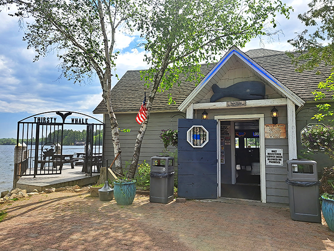 The blue whale sculpture greets hungry visitors like a quirky guardian of deliciousness, hinting at the nautical treasures that await inside this lakeside gem.