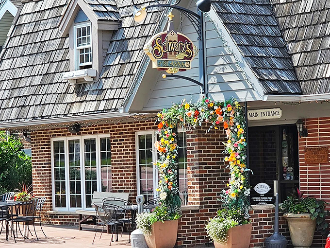 The distinctive shingled roof and brick exterior of Schwarz's Supper Club stands as a beacon of culinary tradition along a quiet New Holstein street.