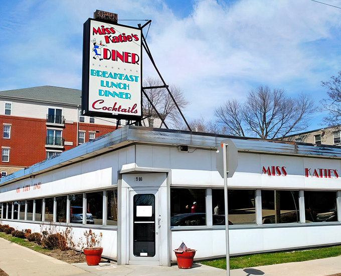 The iconic Miss Katie's Diner sign stands proud against the Milwaukee sky, a beacon of comfort food that's been drawing hungry patrons for decades.