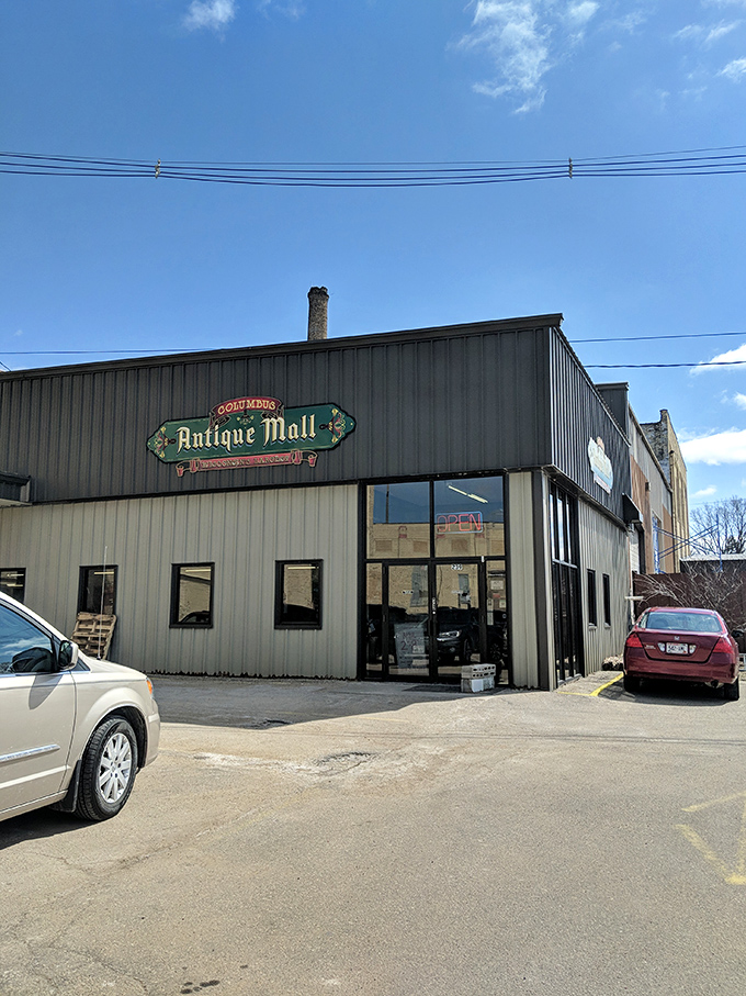 The unassuming exterior of Columbus Antique Mall proves that treasure hunting begins with buildings that keep their secrets well-hidden behind modest facades.