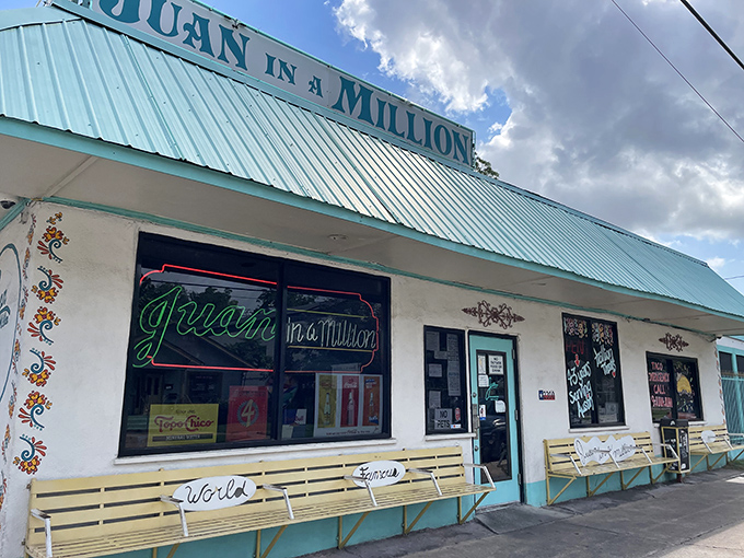The turquoise exterior of Juan in a Million stands as an Austin landmark, promising breakfast taco nirvana behind its unassuming fa&ccedil;ade.