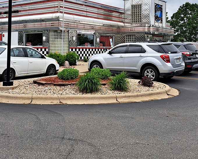 The chrome-clad exterior of Gus's shines like a time machine in the Wisconsin sunshine, complete with that iconic checkerboard trim that screams "great food ahead!"