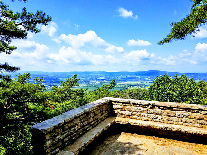 Nature's infinity pool! This stone overlook at Gambrill State Park frames the Frederick Valley like a masterpiece, no Instagram filter required.