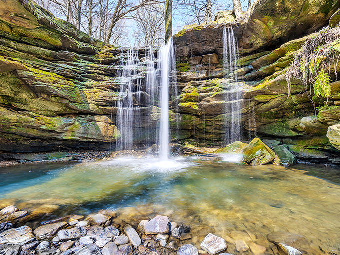 Nature's perfect staircase – water cascading over ancient sandstone ledges creates a mesmerizing display that's worth every step of the journey.