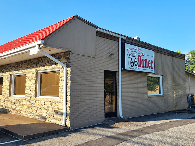 The stone facade and iconic red roof of Kernersville's Route 66 Diner stands as a beacon for hungry travelers seeking authentic comfort food in North Carolina.