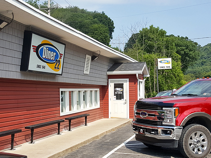 The unassuming red exterior of Diner 22 stands like a beacon of hope for hungry travelers. Good food doesn't need fancy architecture.