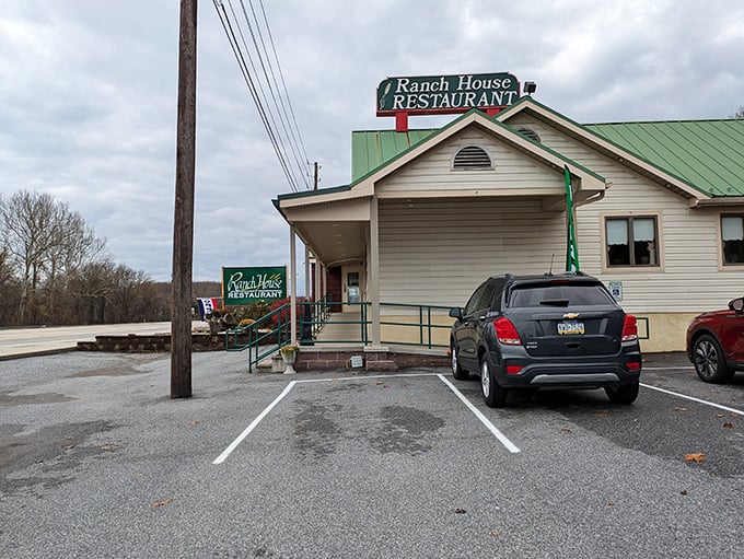The unassuming exterior of Ranch House Restaurant stands like a culinary lighthouse in Duncannon, beckoning hungry travelers with its simple charm and green-roofed promise.