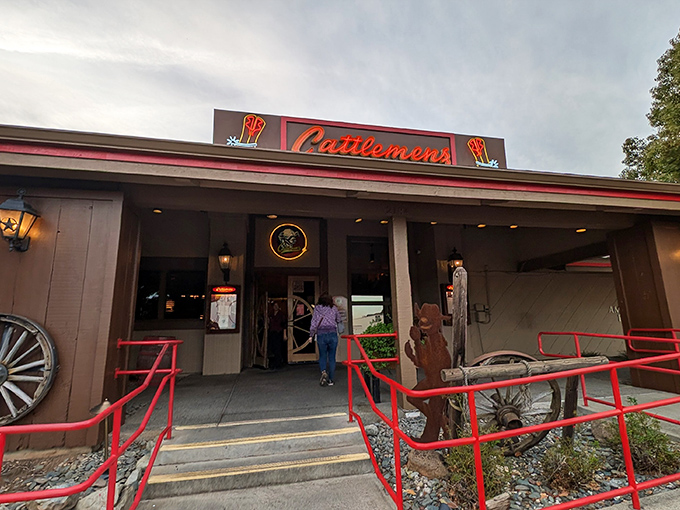 The Western welcome wagon! Cattlemens' rustic exterior promises carnivorous delights within, standing proud against the California sky like a beef sanctuary.