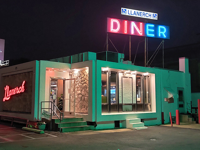 The neon glow of Llanerch Diner's iconic sign transforms an ordinary night into a Edward Hopper painting come to life. Classic Americana at its finest.