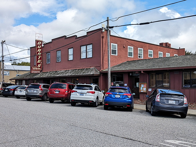 The brick-red exterior of Duarte's Tavern stands like a culinary lighthouse on Pescadero's main drag, beckoning hungry travelers with its vintage neon sign.