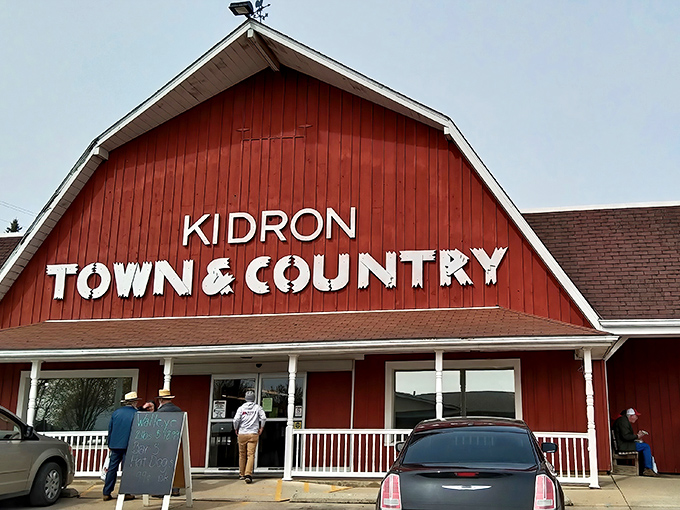 The iconic red barn exterior of Kidron Town & Country Market stands as a beacon of culinary promise in Ohio's Amish Country.
