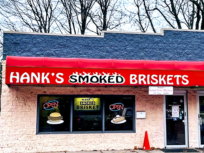 The bright red awning of Hank's stands out like a beacon for barbecue pilgrims, promising smoky salvation on Indianapolis's MLK Jr. Street.