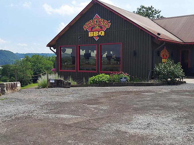 That unassuming green building holds more barbecue magic than a Vegas showroom holds sequins.