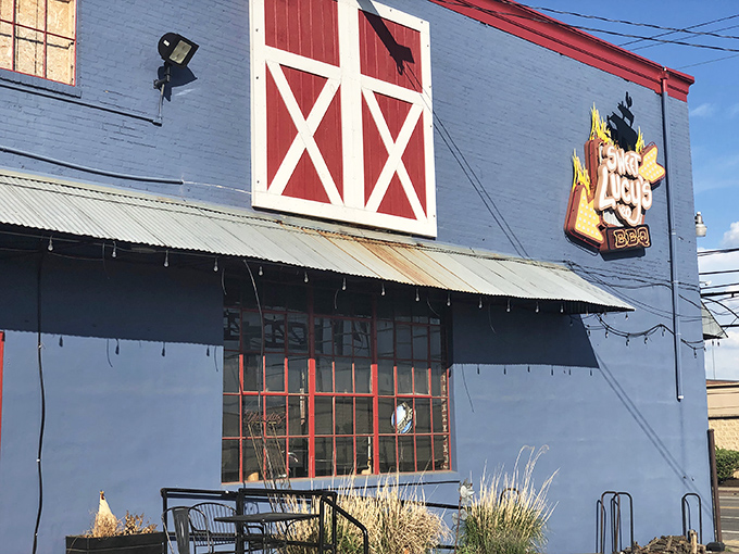 The unassuming exterior of Sweet Lucy's Smokehouse hides a temple of barbecue brilliance within. Like finding a Picasso at a yard sale.