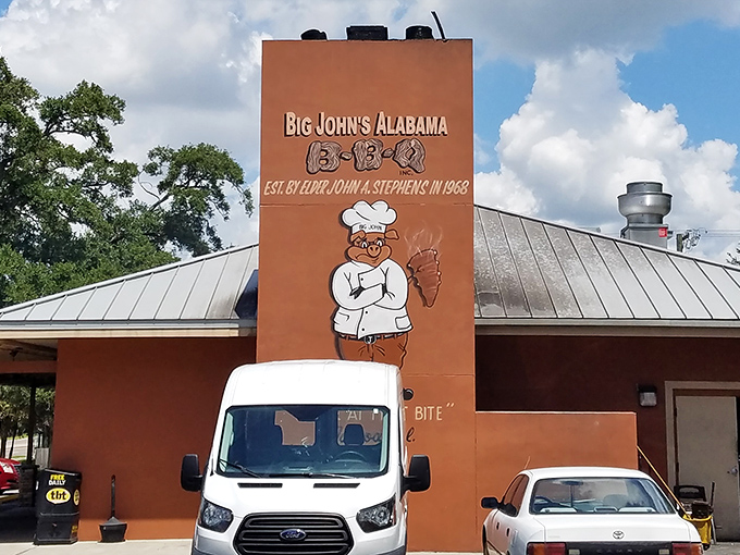 The unassuming exterior hides barbecue greatness like a superhero's secret identity. This modest building houses smoky treasures worth crossing county lines for. 