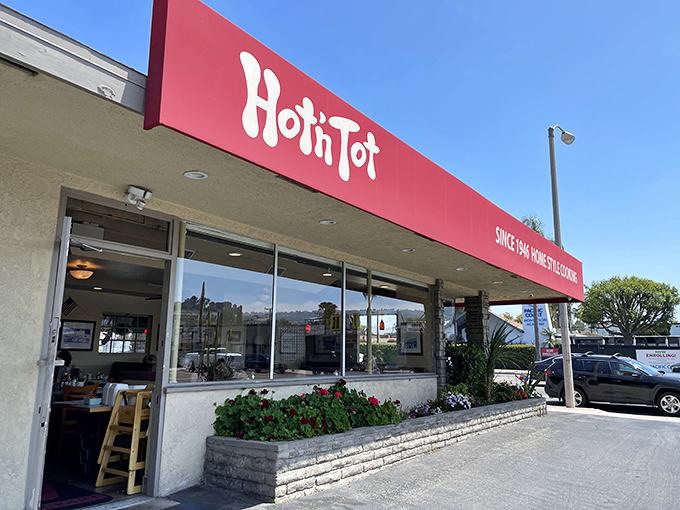 That iconic red arrow sign isn't just pointing to breakfast&mdash;it's directing you toward a time machine disguised as a diner. Pure roadside Americana at its finest.