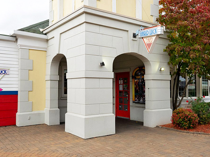 The iconic entrance to Mel's Hard Luck Diner beckons with retro charm and the promise of musical delights within.