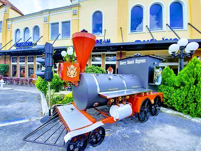 All aboard the flavor express! The Cherry Smash Express train welcomes visitors with vintage charm before they embark on a sweet journey through ice cream paradise.