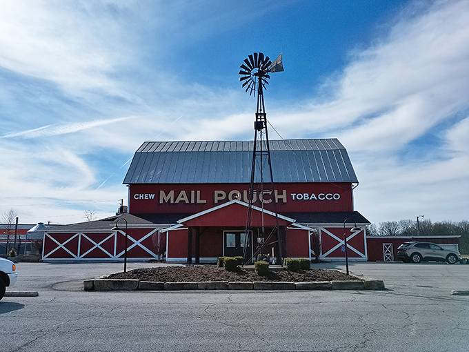 The iconic red barn exterior with its Mail Pouch Tobacco sign and spinning windmill isn't just Instagram-worthy&mdash;it's a promise of authentic Midwestern flavor waiting inside.