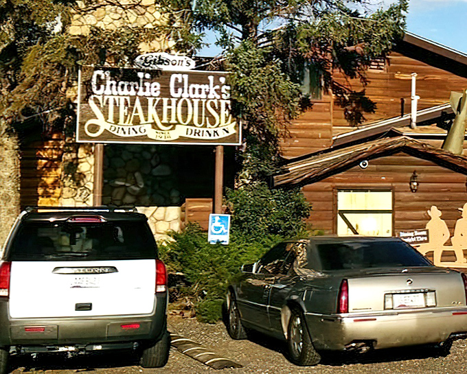 The rustic log cabin exterior of Charlie Clark's isn't just inviting&mdash;it's practically whispering "come in and loosen your belt" to hungry travelers.