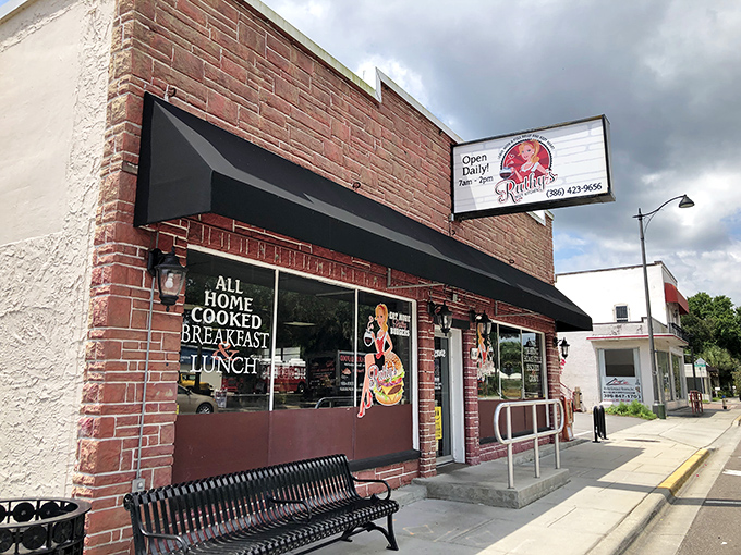 The unassuming brick exterior of Ruthy's Kozy Kitchen promises what every great diner should: homestyle cooking without pretension. The sign doesn't lie—this place is genuinely kozy.