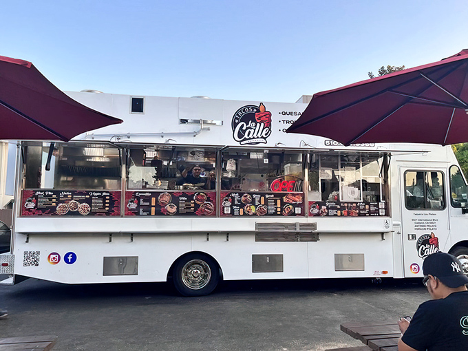 The gleaming white chariot of flavor that's worth the pilgrimage. Tacos La Calle's truck stands ready to transform your understanding of street food.