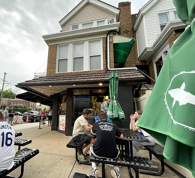 The unassuming facade of Dalessandro's hides culinary greatness, like Clark Kent's glasses concealing Superman's identity.