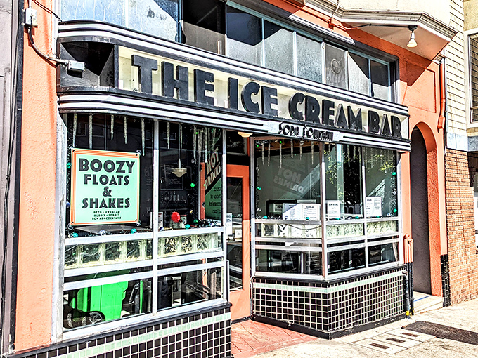 The neon promise of "BOOZY FLOATS & SHAKES" isn't just signage&mdash;it's a beacon of joy calling to your inner child and your very adult taste buds.