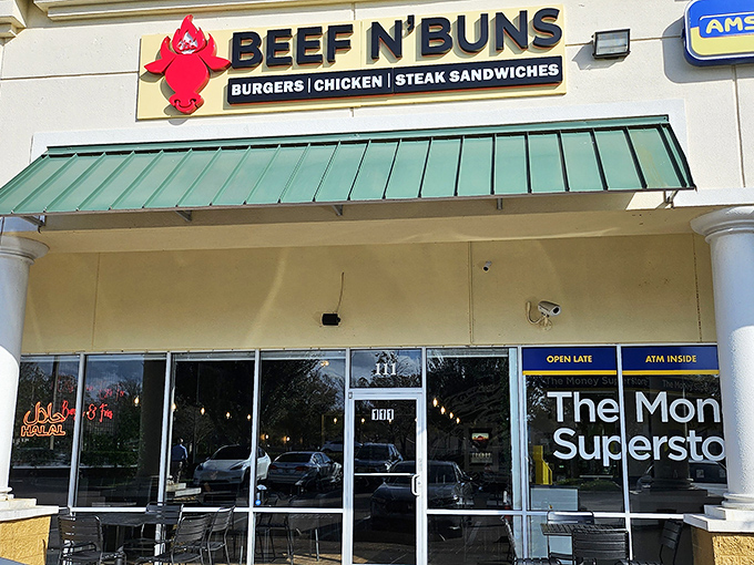 The red bull logo winks at hungry passersby, promising a burger experience worth crossing county lines for. No fairy dust needed.