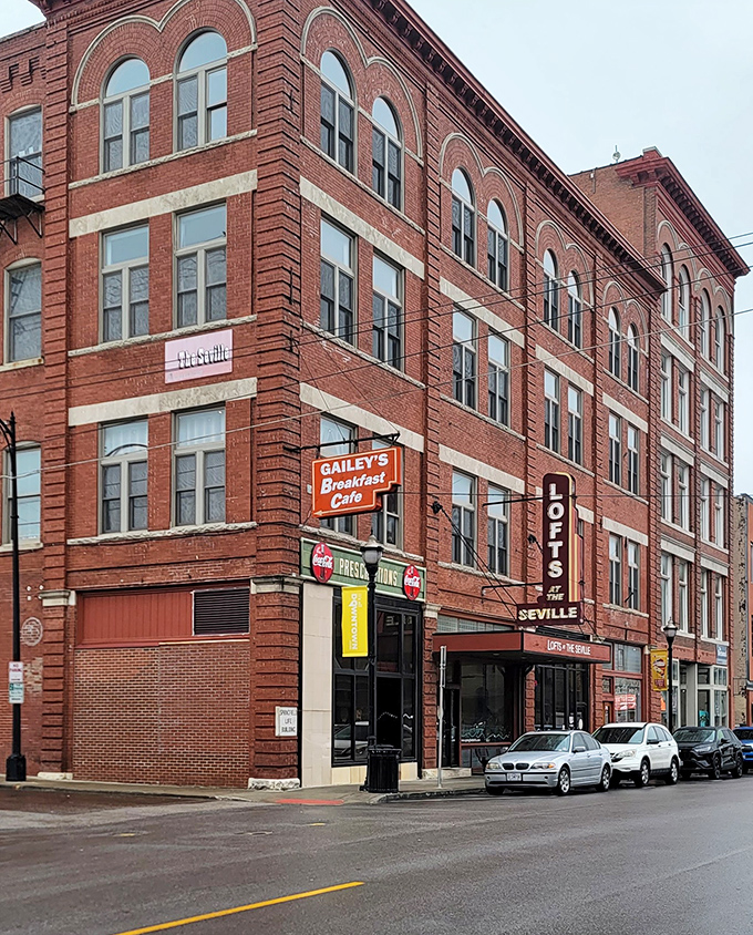 The iconic orange Gailey's sign beckons breakfast enthusiasts like a beacon of hope on Springfield's historic brick landscape. Morning salvation awaits inside!