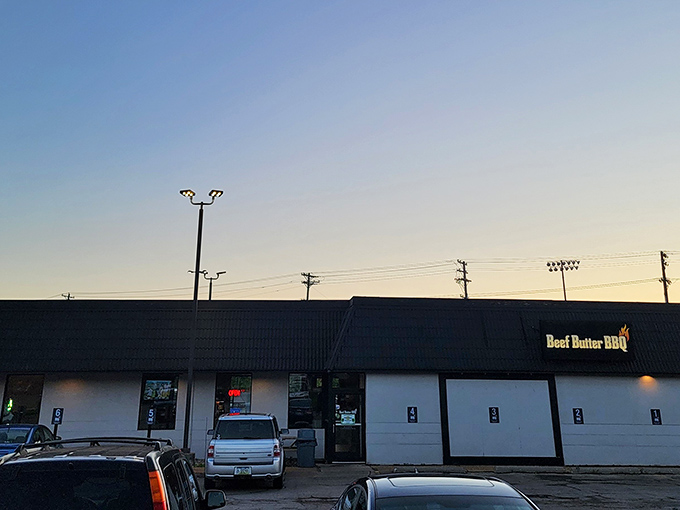 Don't let the humble exterior fool you – behind this unassuming façade lies a barbecue paradise that's been known to convert vegetarians with a single whiff.