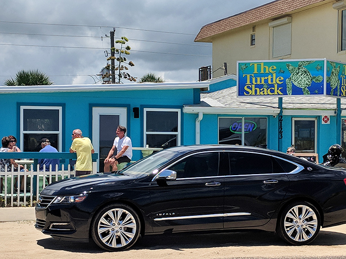 The turquoise beacon of seafood salvation! The Turtle Shack's vibrant exterior promises Florida coastal dining at its most authentic and unpretentious.