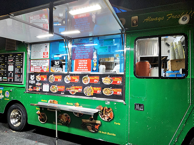 That emerald green food truck isn't just transportation &ndash; it's a mobile temple of authentic Mexican flavors. 