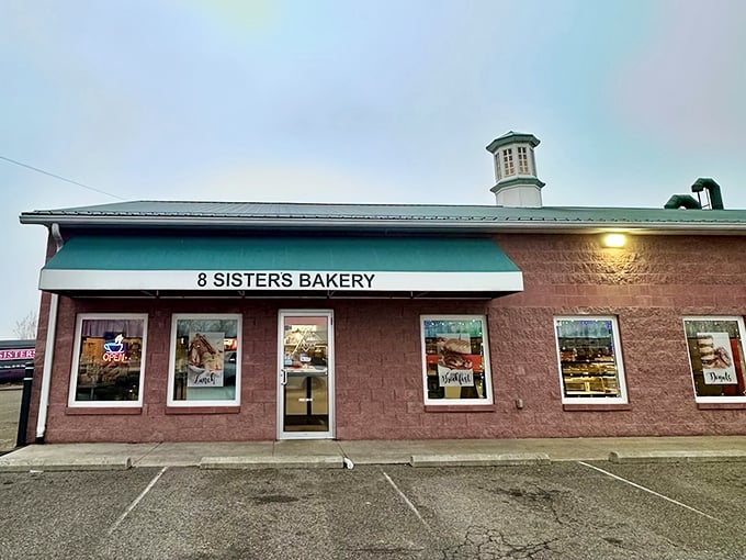 The pink building that houses 8 Sisters Bakery stands like a beacon of sweetness in Mt. Gilead, promising delicious treasures within.